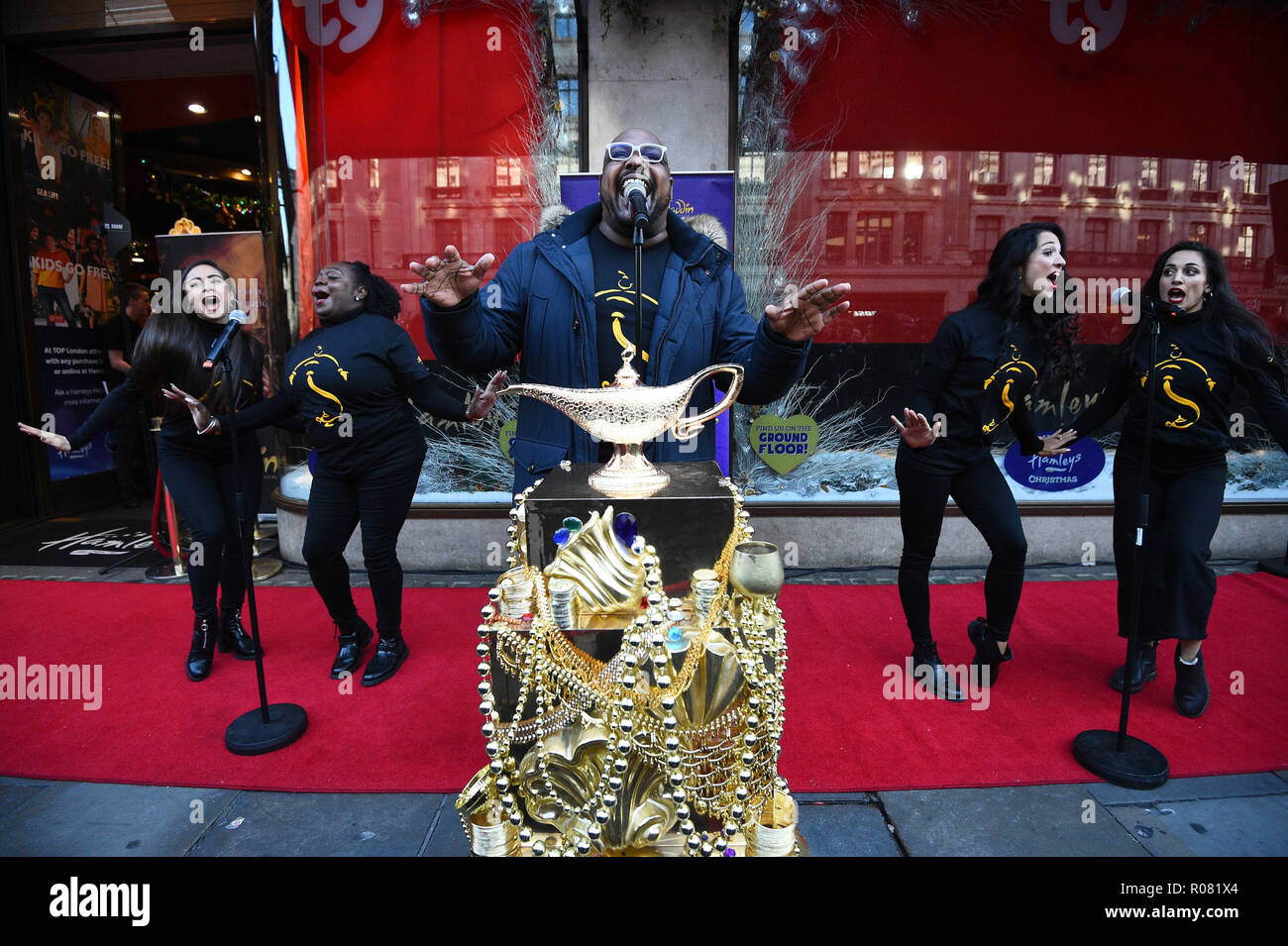 The cast of Aladdin perform at the unveiling of the Hamleys Christmas ...