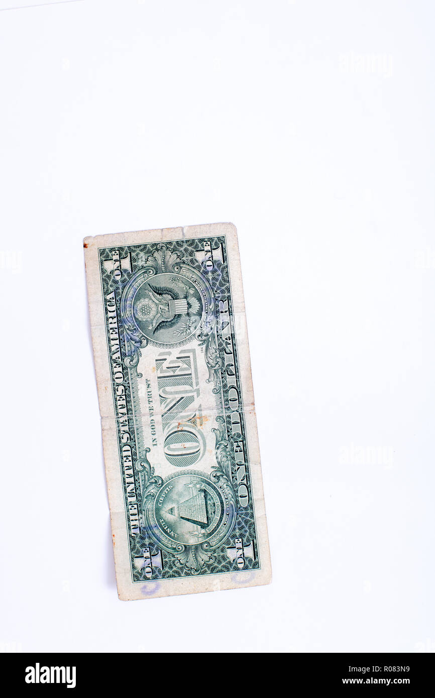 One dollar, back side of banknote, used paper money on white background ...