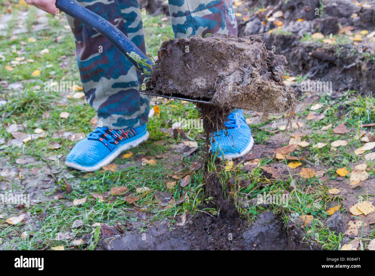 Man digging clay garden hi-res stock photography and images - Alamy