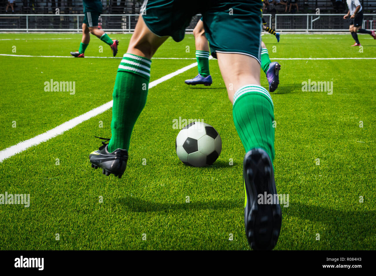 Football Players playing football Stock Photo - Alamy