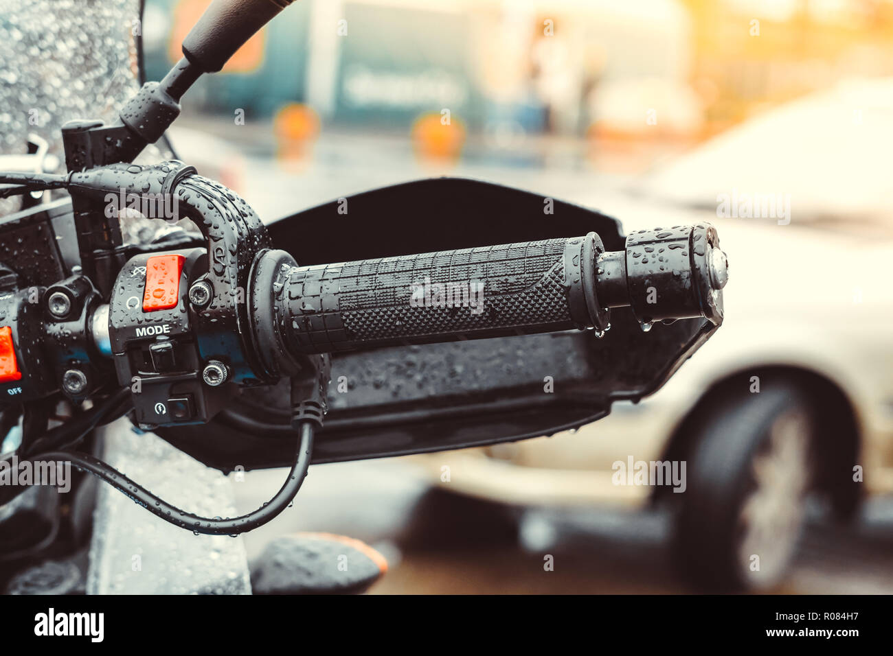 the handle of the motorcycle standing on the street Stock Photo - Alamy