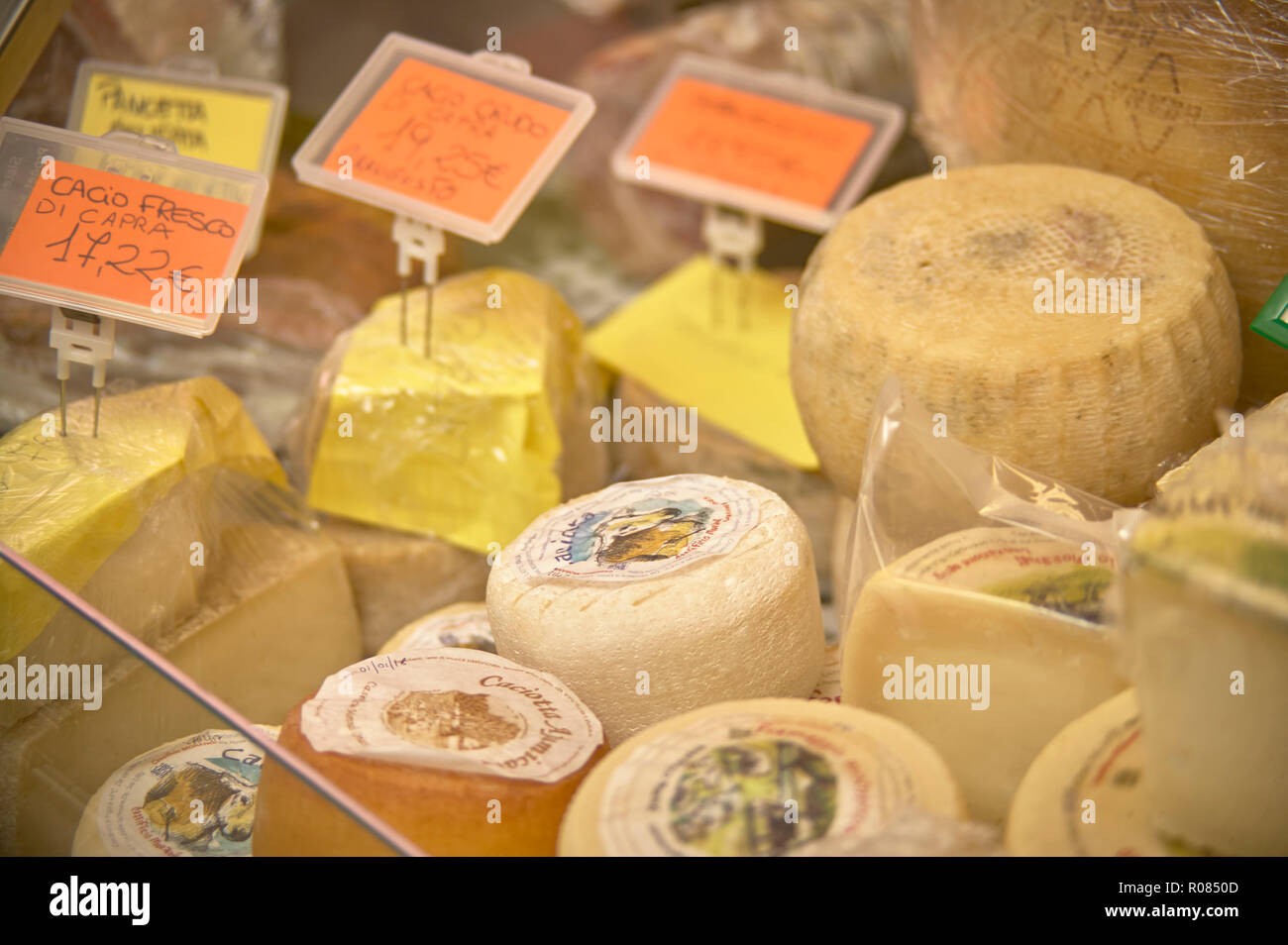 Pieces of cheese inside a shop window for a retail store Stock Photo ...
