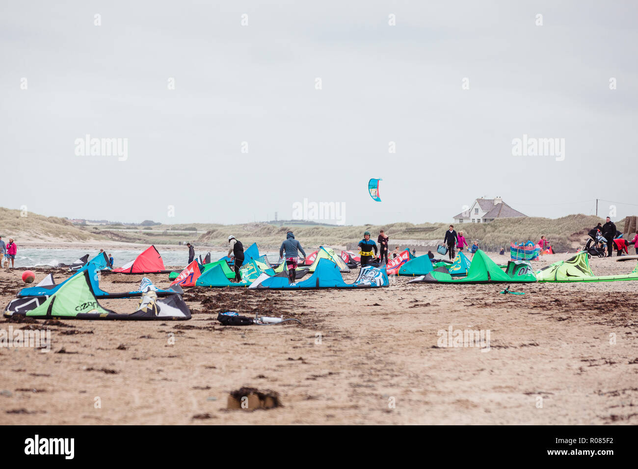 Lots of colourful kites on the beach, kite surfing, Rhosneigr, Anglesey ...