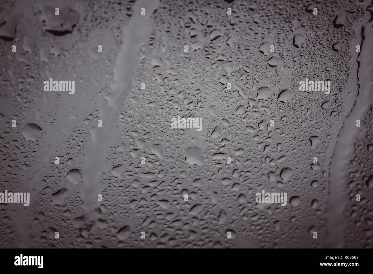 Drops of water on the glass. Background of water drops flowing down the ...