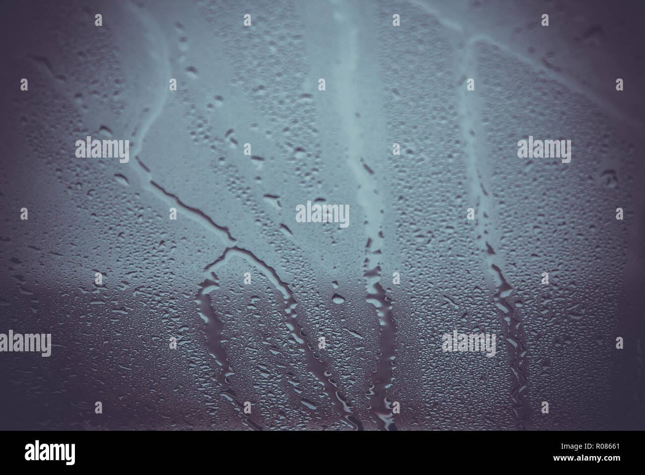 Drops of water on the glass. Background of water drops flowing down the ...