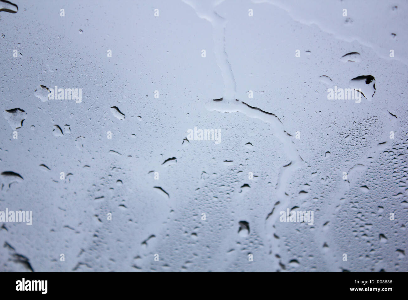Drops of water on the glass. Background of water drops flowing down the ...