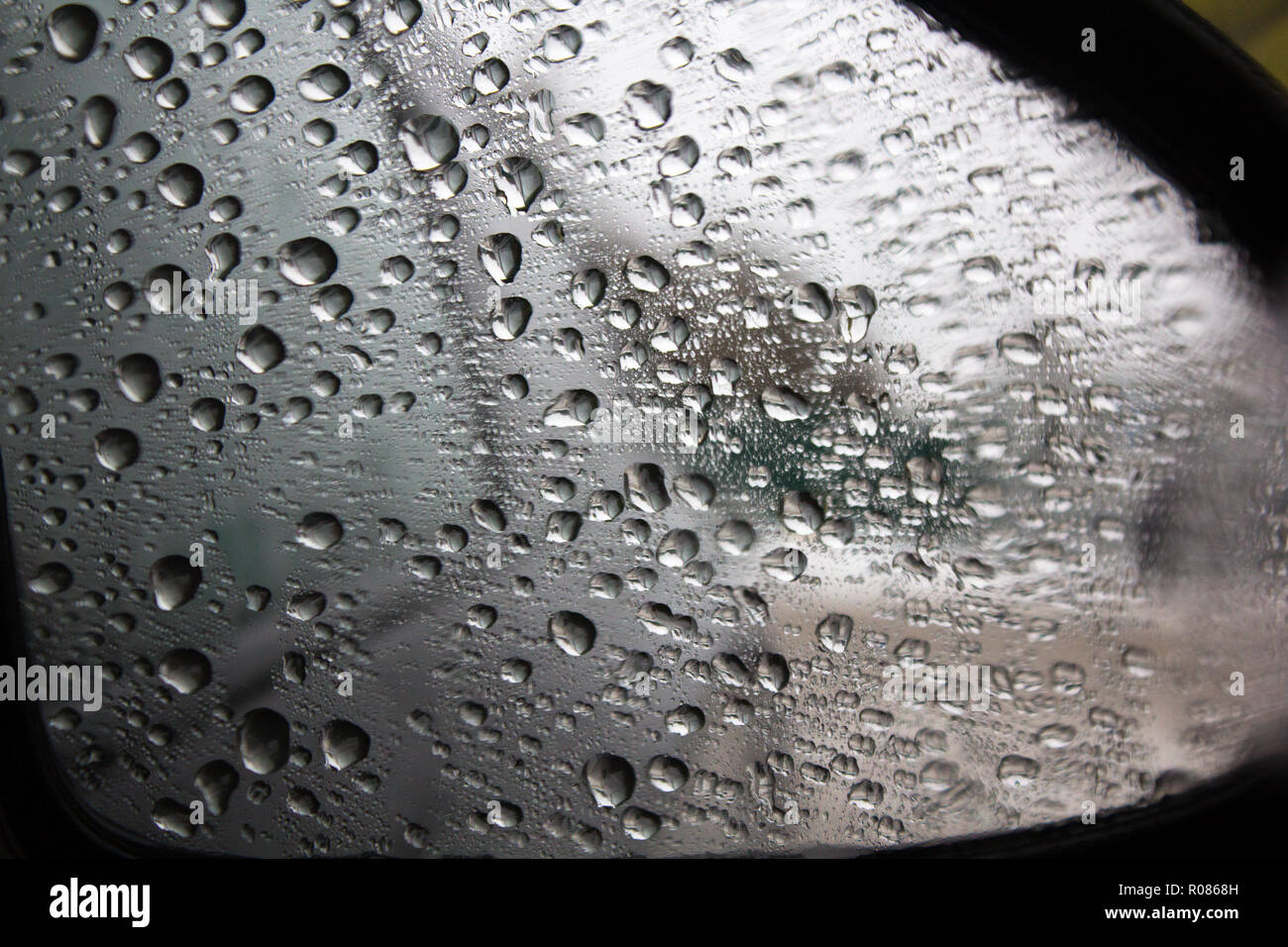 Drops of water on the glass. Background of water drops flowing down the ...