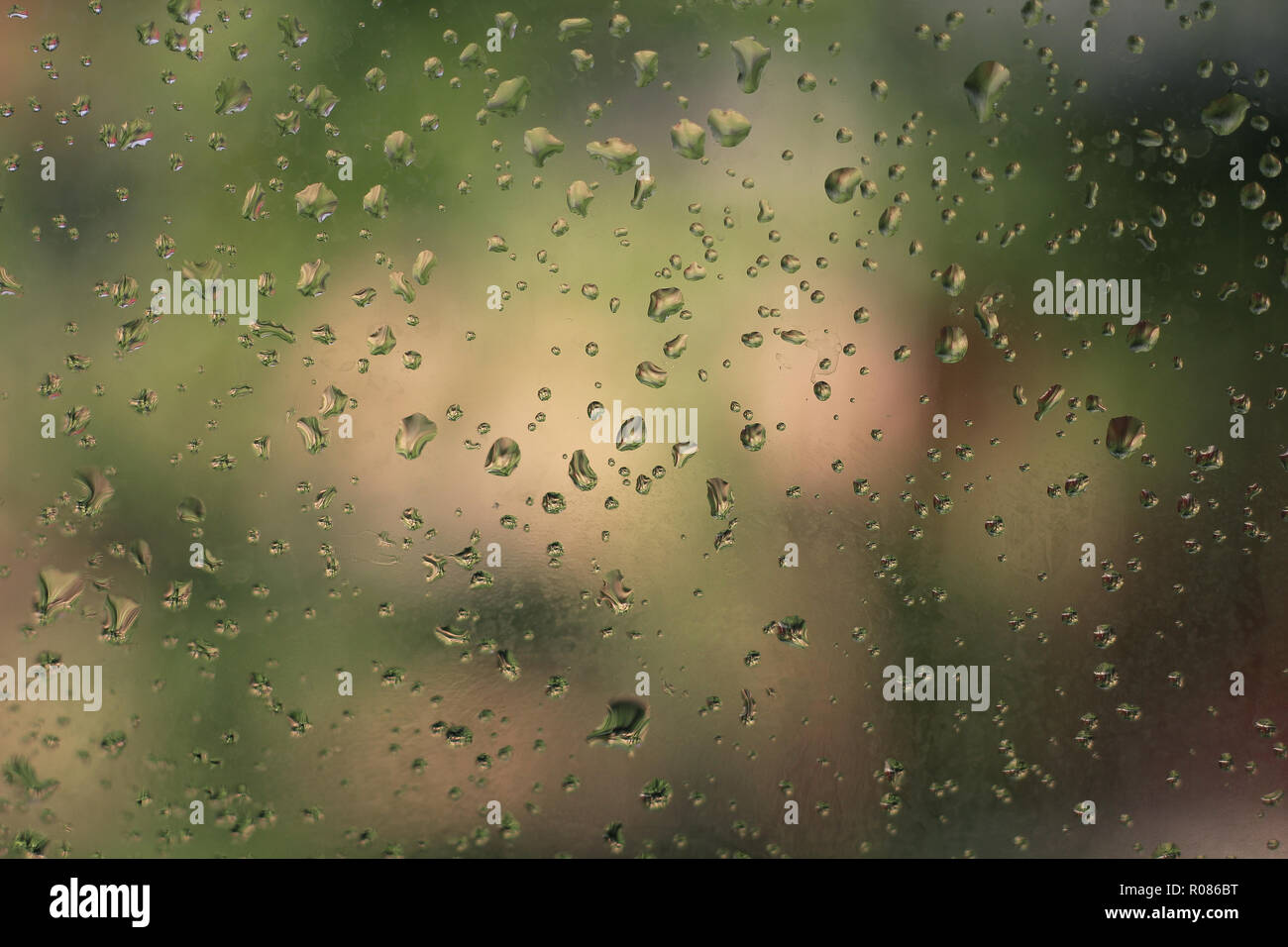 Drops of water on the glass. Background of water drops flowing down the ...