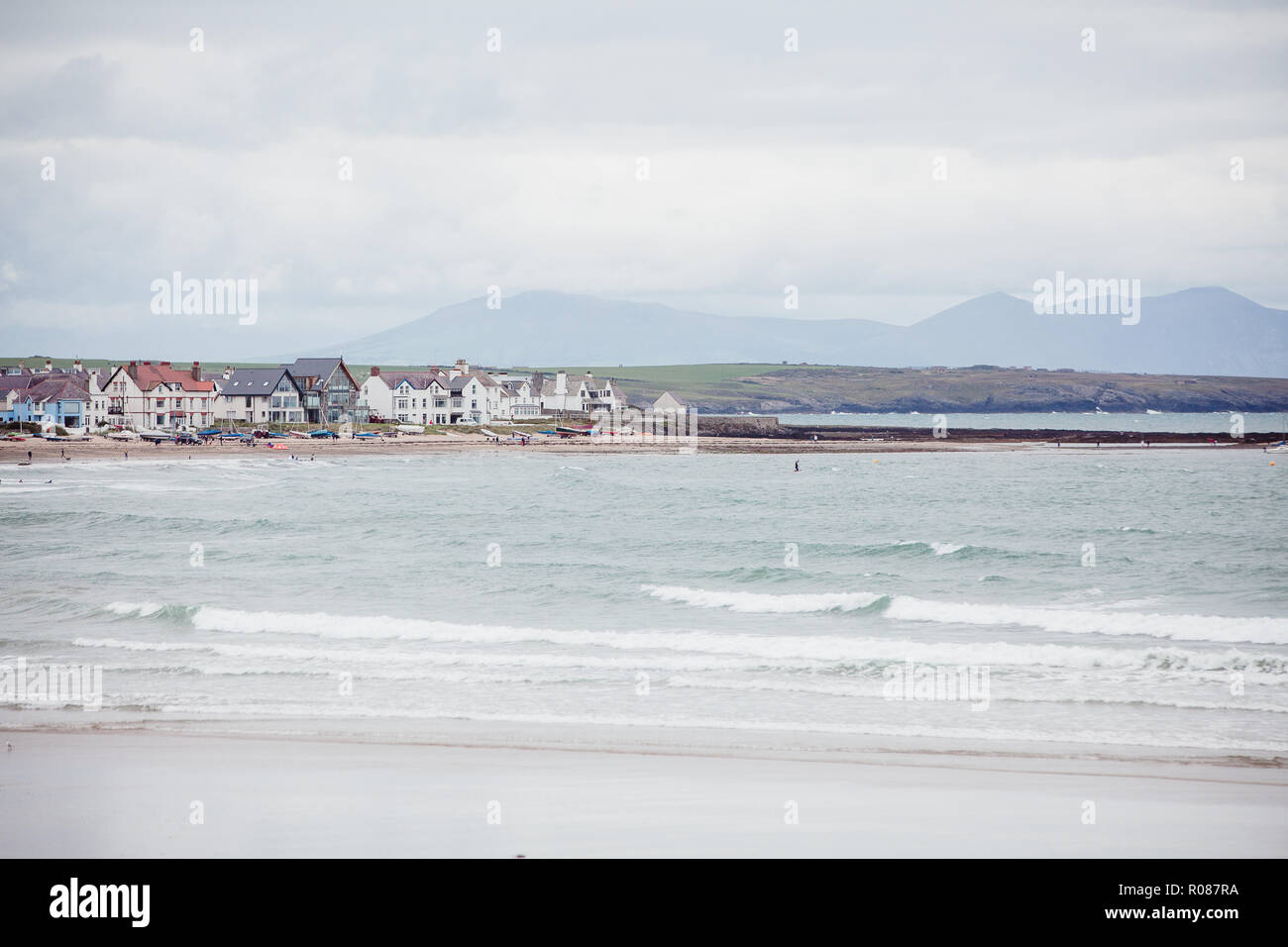 Looking across Cymyran beach towards Rhosneigr town, Anglesey, North ...