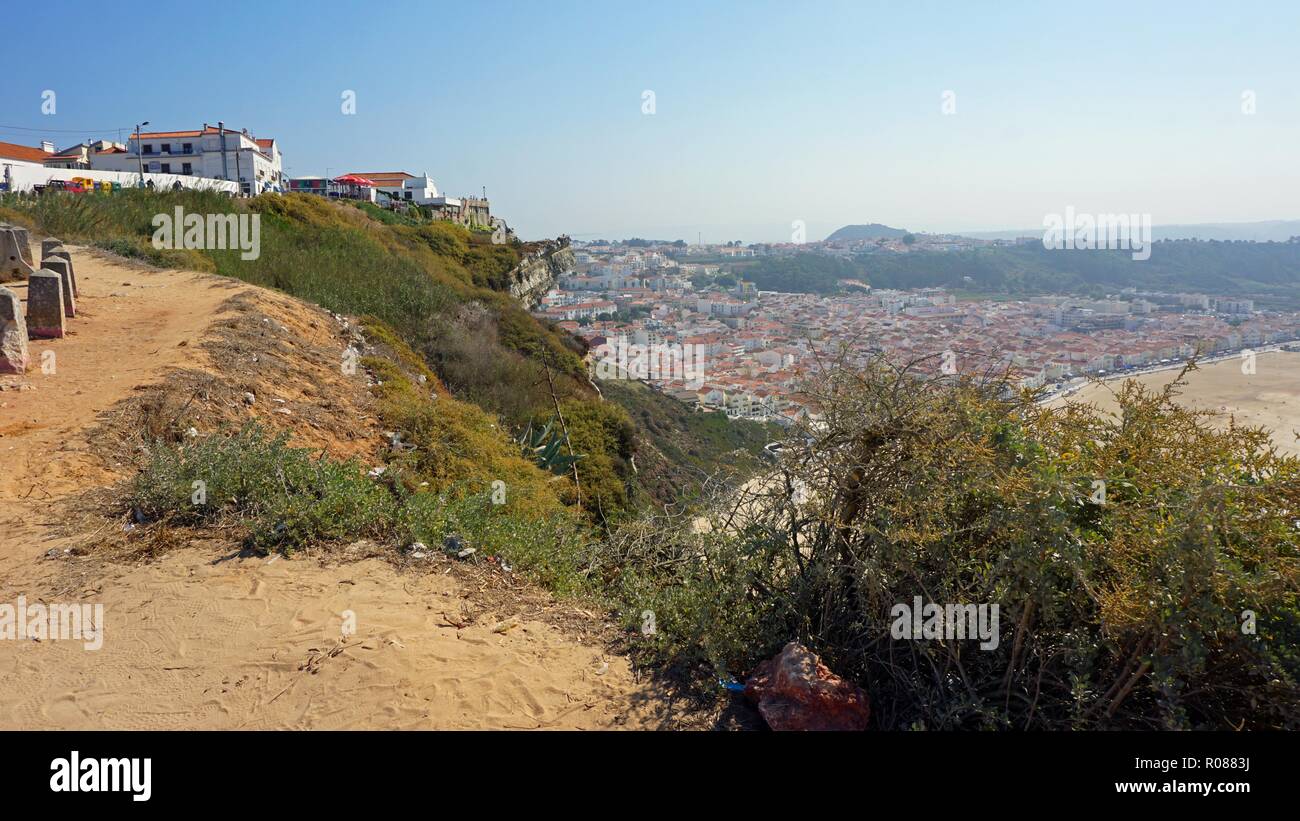 shore line of small tourist village nazare in portugal Stock Photo - Alamy