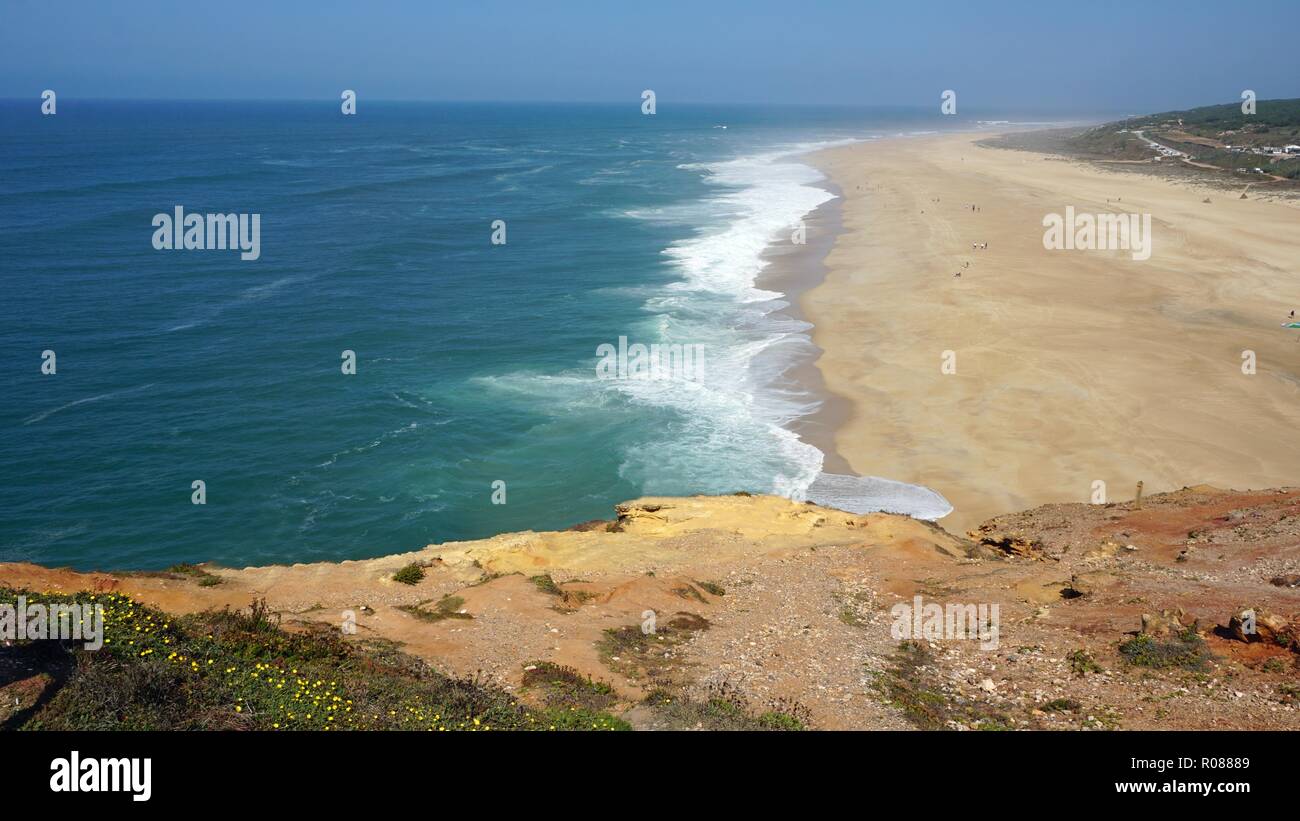 shore line of small tourist village nazare in portugal Stock Photo - Alamy