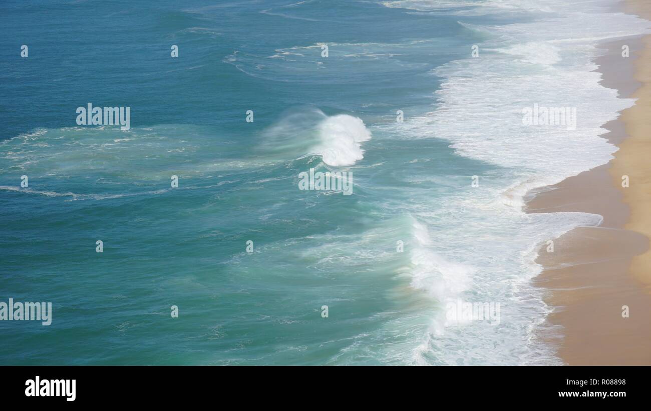 shore line of small tourist village nazare in portugal Stock Photo - Alamy