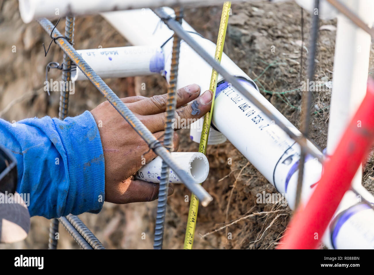 Construction workers using tape construction site hi-res stock ...