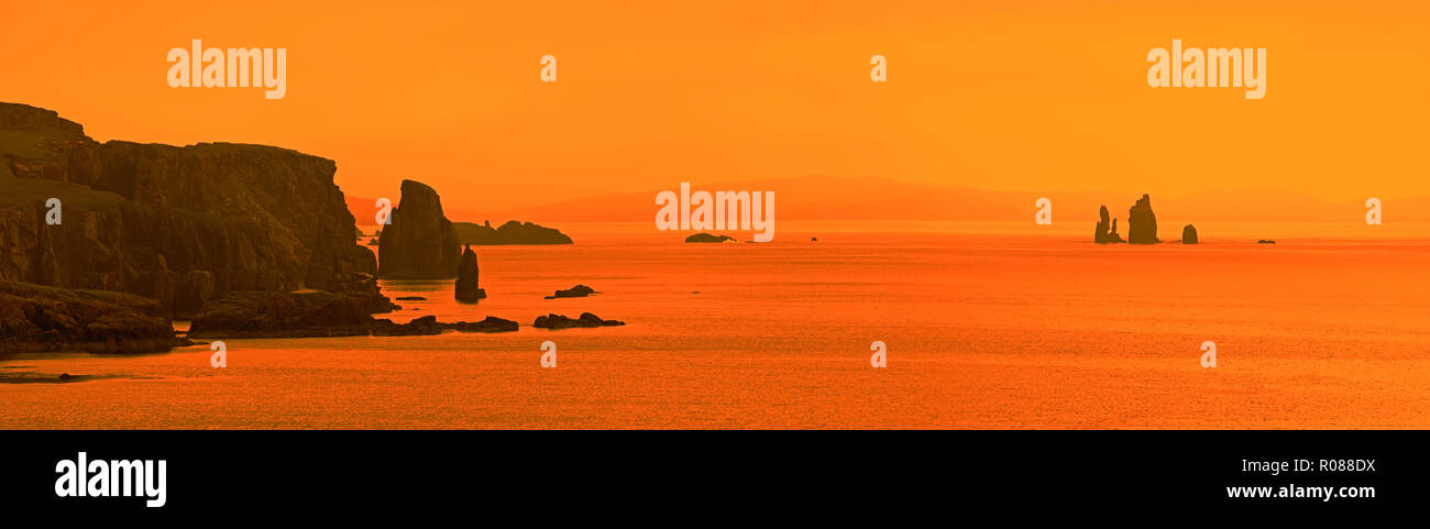 The Drongs at sunset, sea stacks in St Magnus Bay near Ness of ...