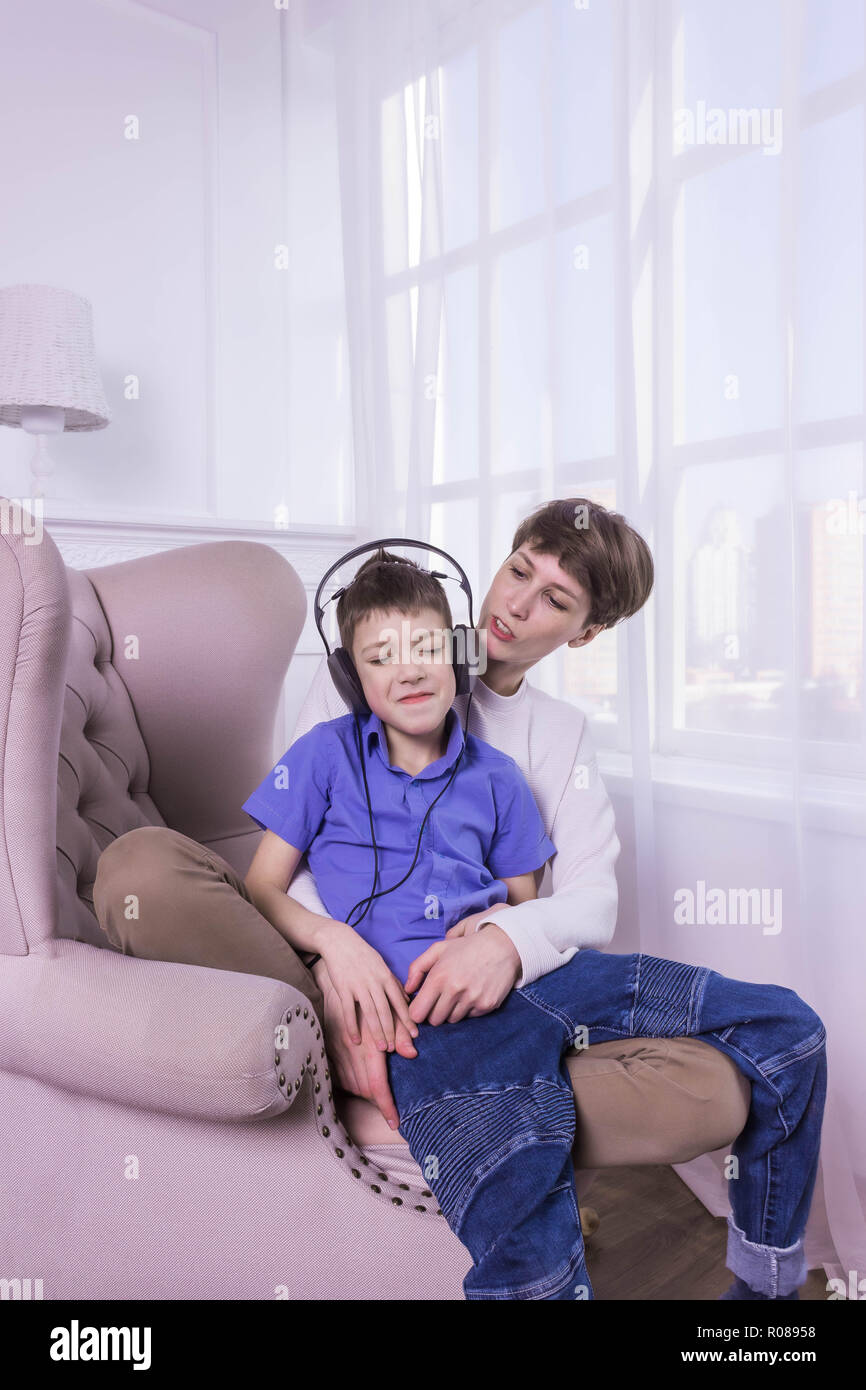 Mother Screaming To Her Son While He Listening Music And Doesnt Listen