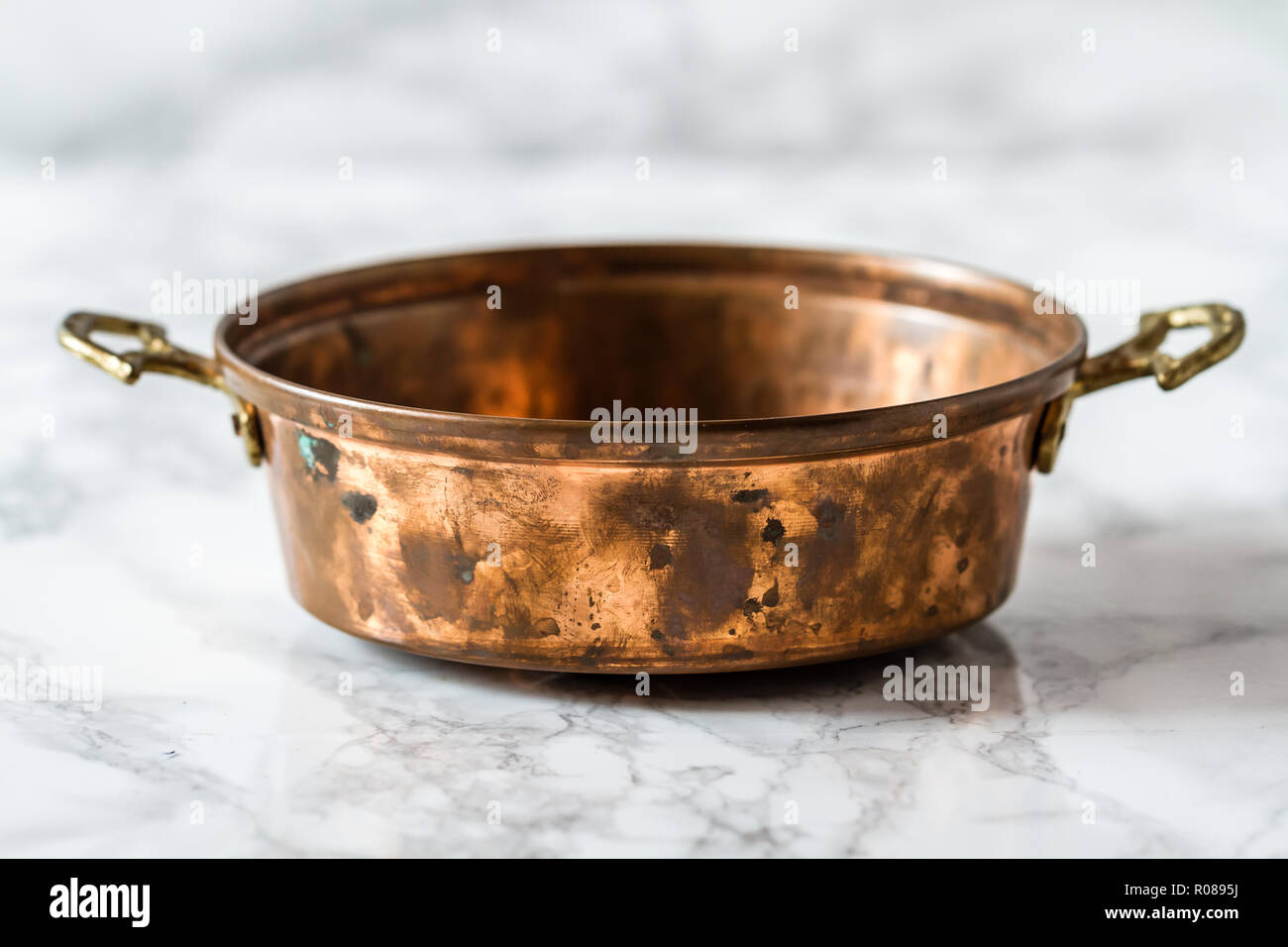 Authentic handmade Turkish copper pan with brass handles Stock Photo ...