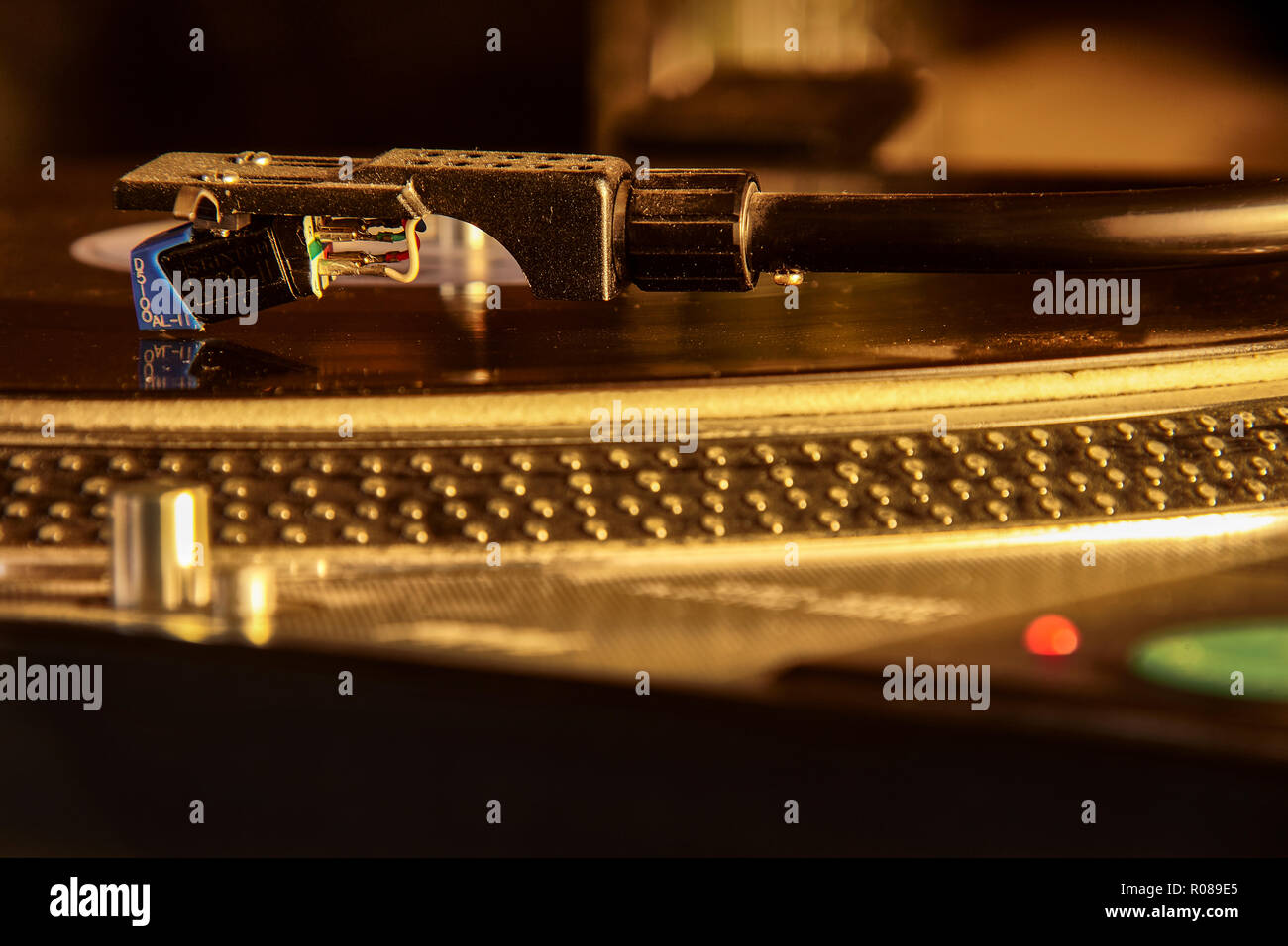 Old vintage turntable dusted and worn but still working inside a disco ...