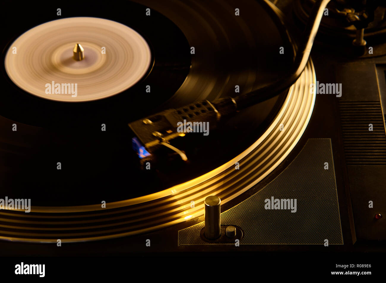 Vintage turntable with movement effect on the vinyl record while ...