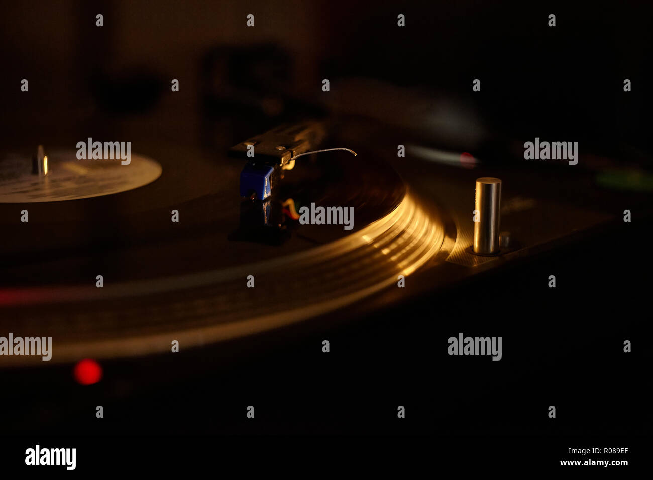 Vintage turntable while playing a vinyl record Stock Photo - Alamy