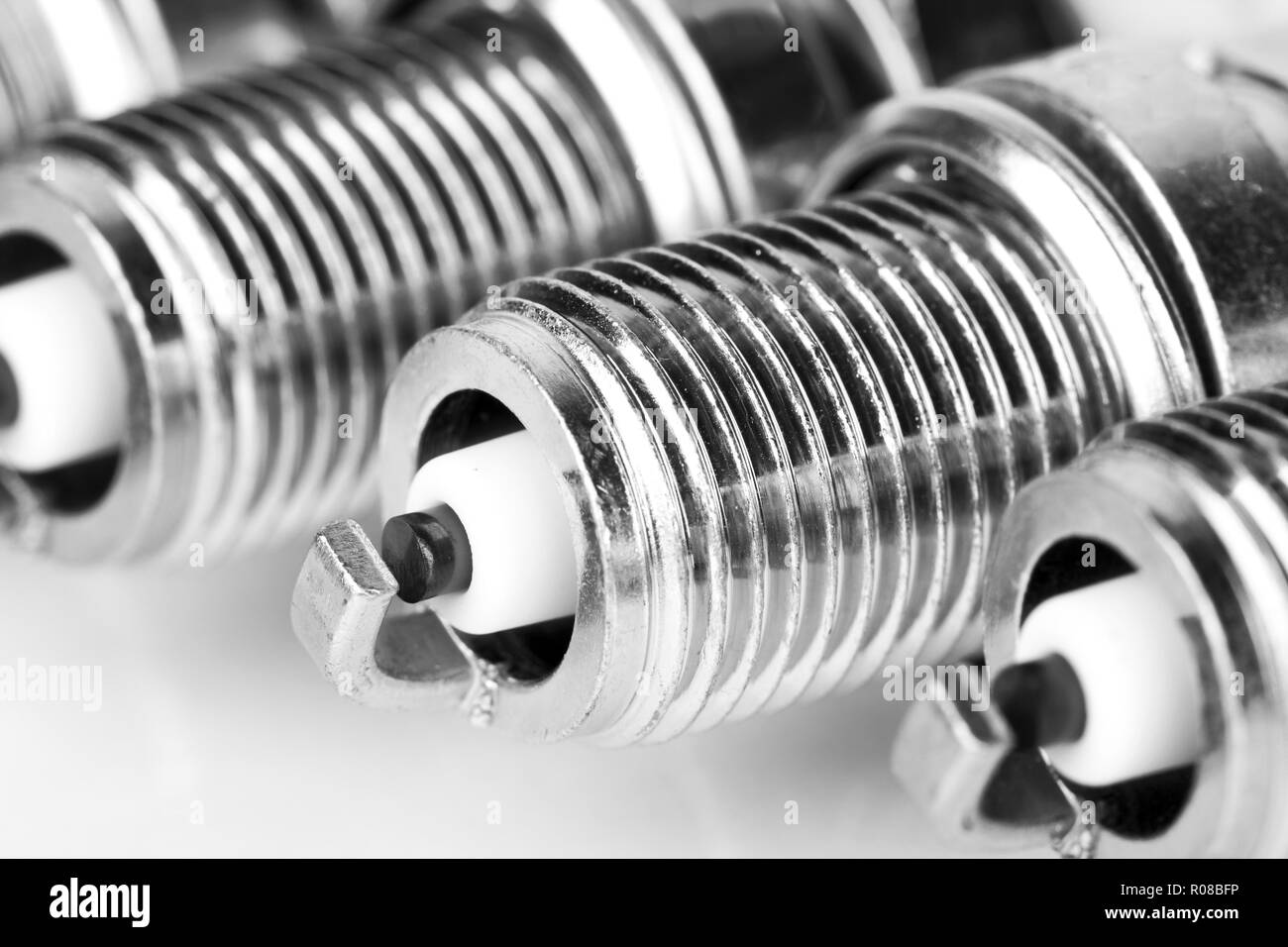 Set of spark plugs for the car on a white background Stock Photo - Alamy