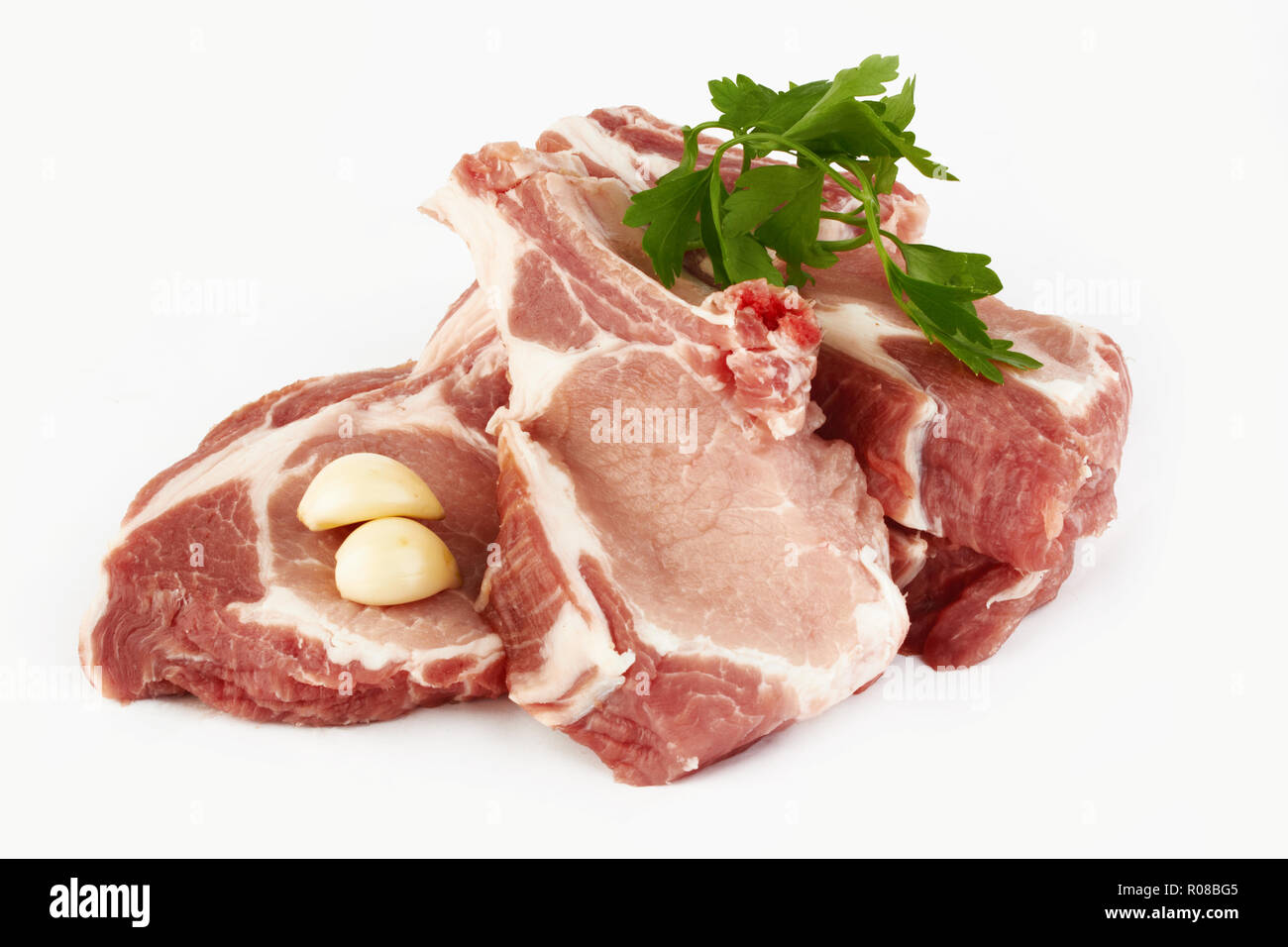 meat raw pork cutlet on a white background Stock Photo - Alamy