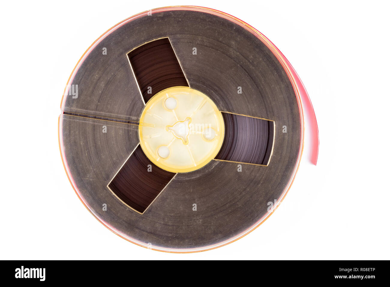 Old scratched reel music tape isolated on white background Stock Photo ...