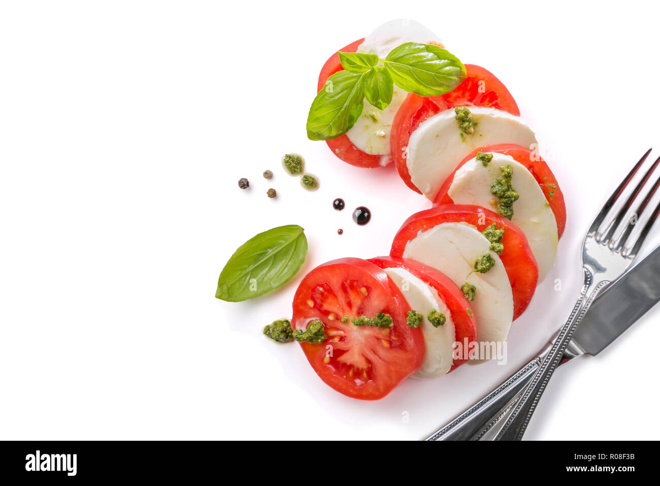Italian cuisine concept - caprese salad isolated on white, top view ...