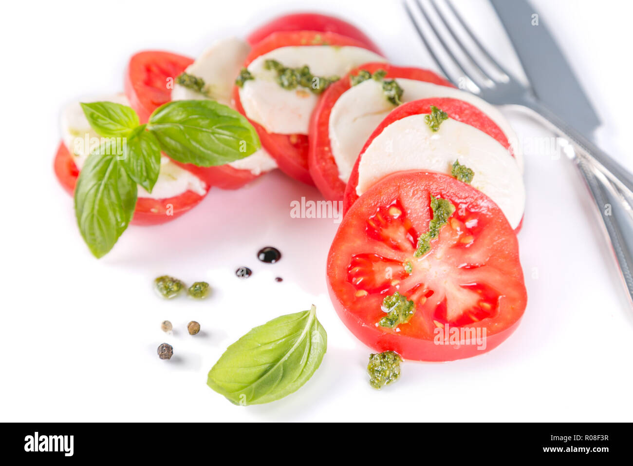 Italian cuisine concept - caprese salad isolated on white, top view ...