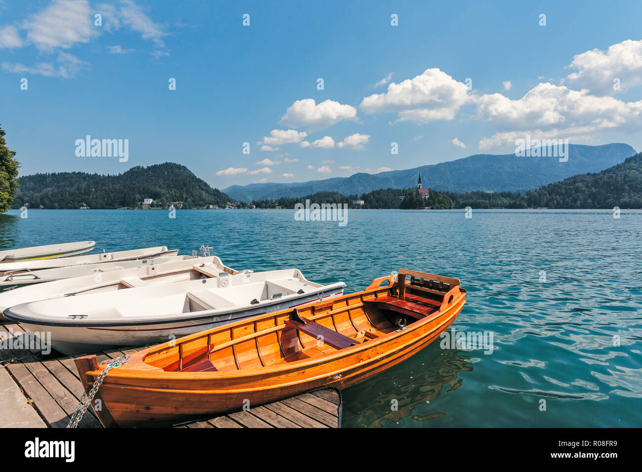 Boat moorage on the shores of Lake Bled Stock Photo - Alamy