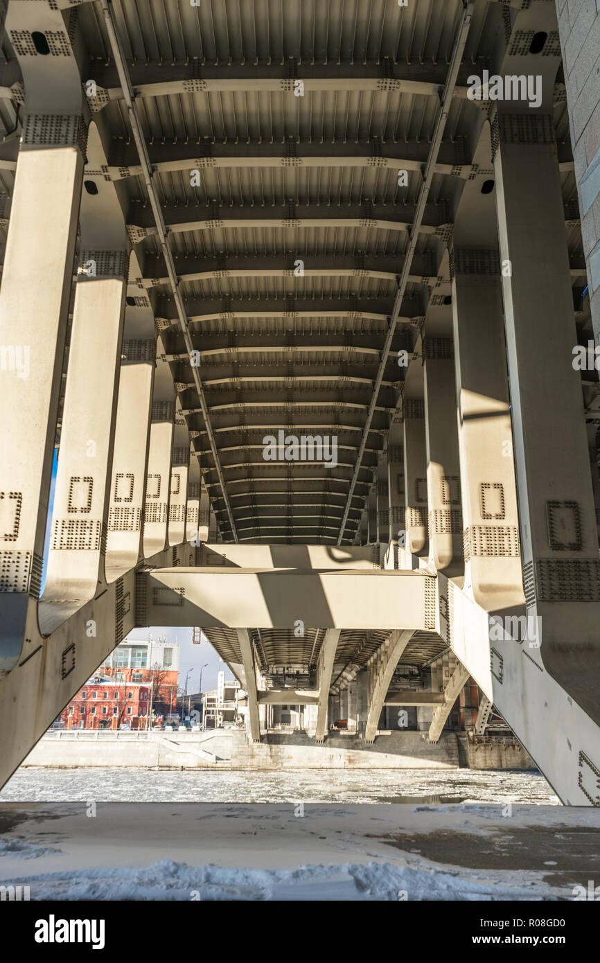 Metal bridge supporting structure. Bottom view. Closeup Stock Photo - Alamy