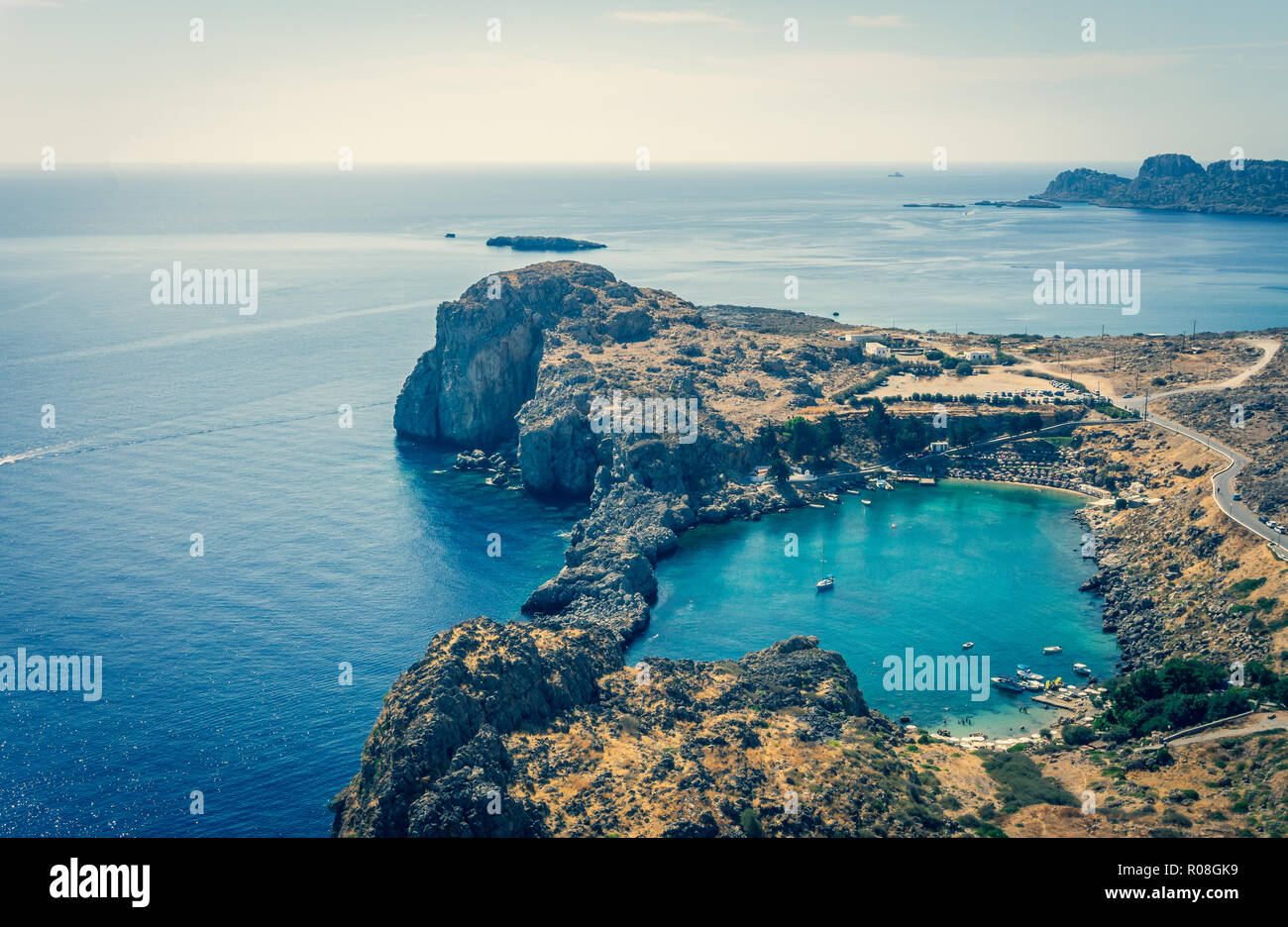 Vintage horizontal photo with nice cove on Rhodes island. Cove is ...