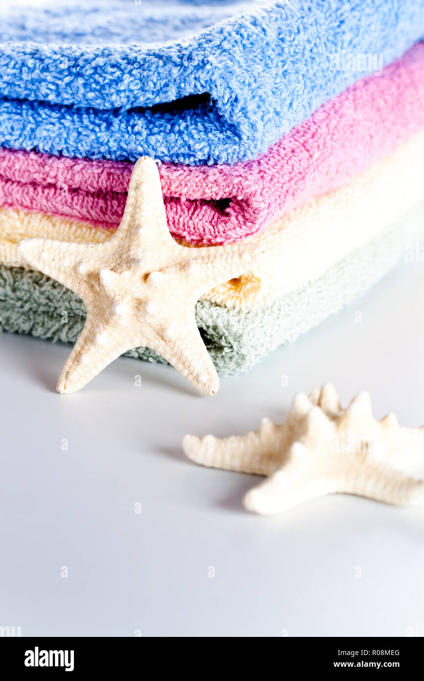 colorful towels and sea stars closeup Stock Photo - Alamy