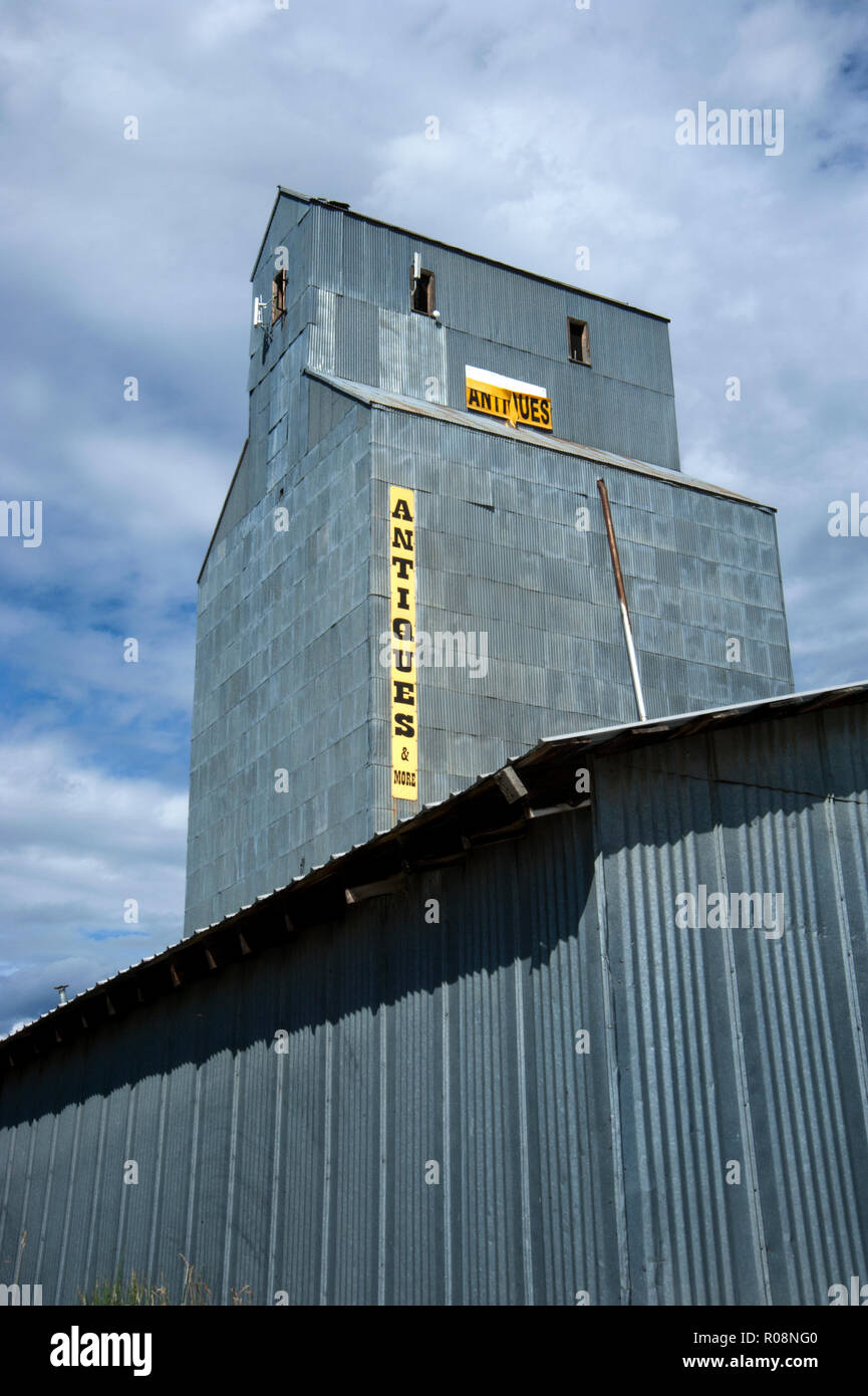 Antiques sign on large storage silo in Montana, USA Stock Photo - Alamy