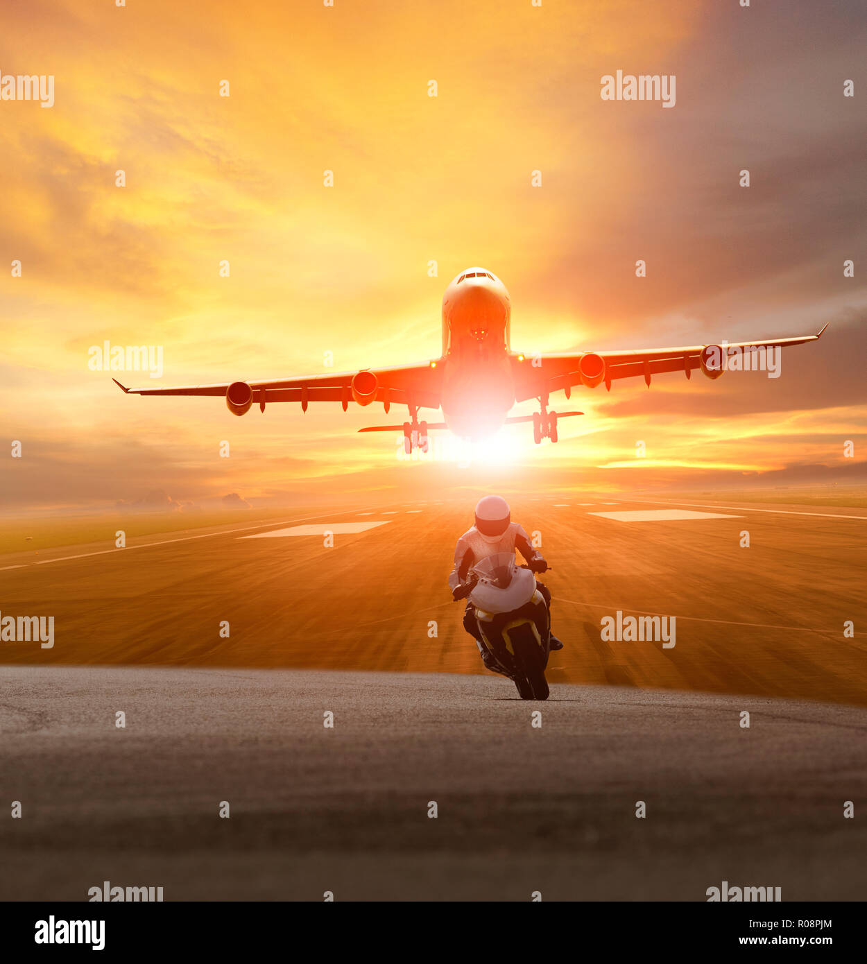 man riding motorcycle on road and plane take off from airport runway ...