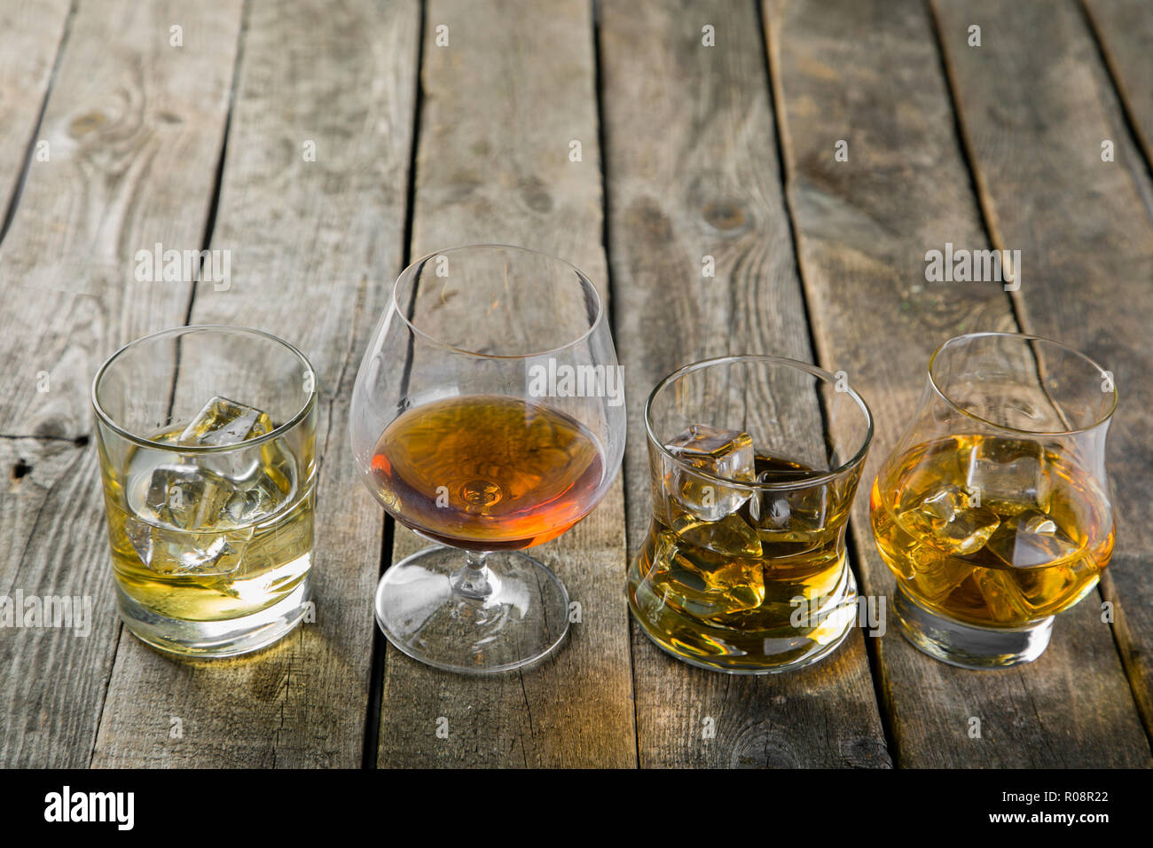 Different types of strong alcohol - bourbon, whiskey, scotch and cognac ...