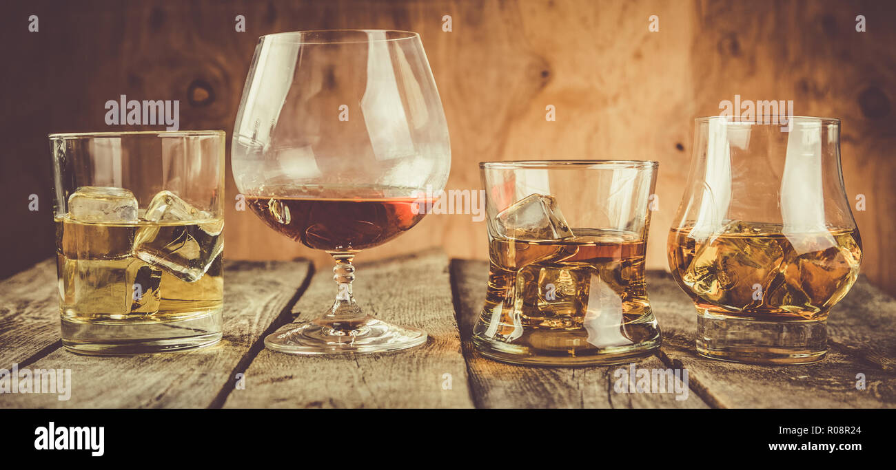 Different types of strong alcohol - bourbon, whiskey, scotch and cognac ...