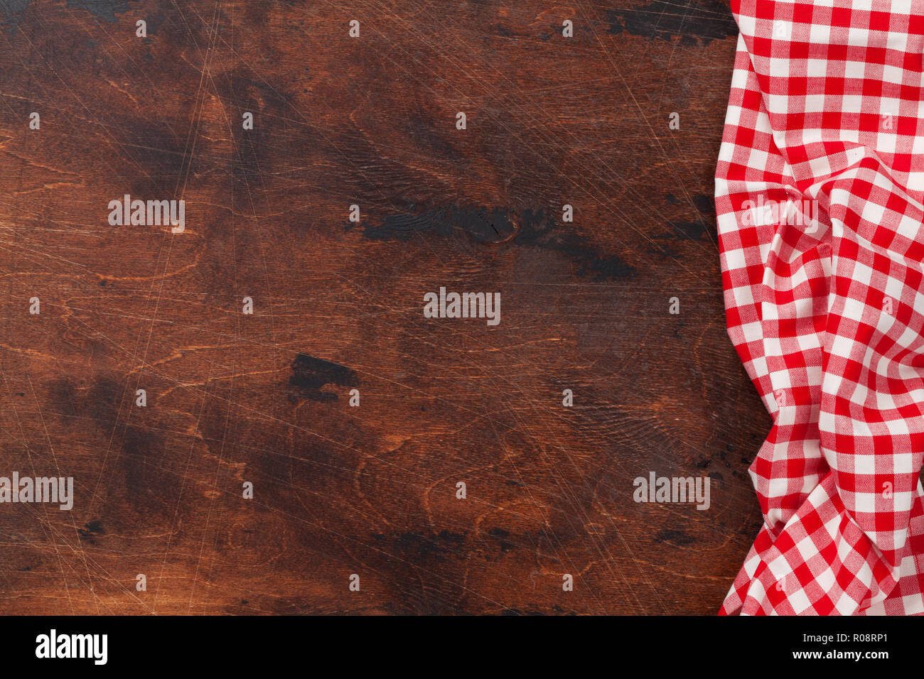 Cooking wooden table with kitchen towel or napkin. Top view with space ...