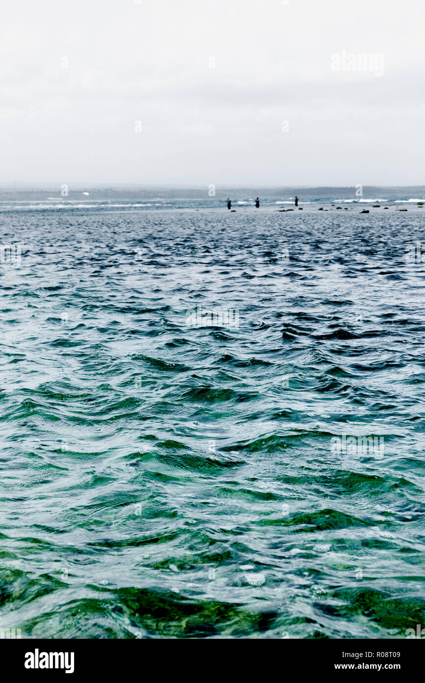 Abstract shape of water forming path toward fisherman Stock Photo - Alamy