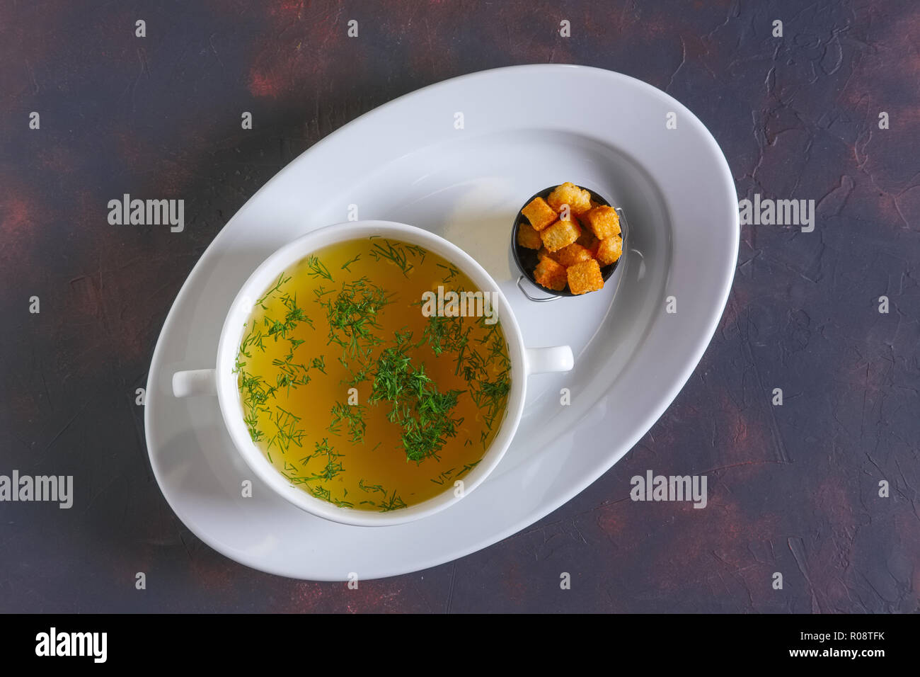 Plate of chicken bouillon Stock Photo - Alamy
