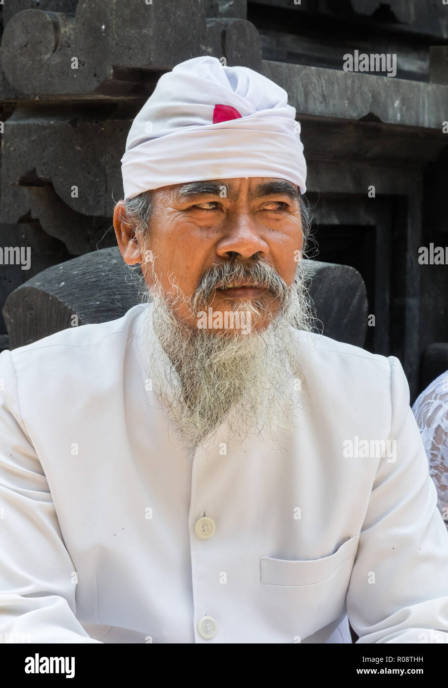 Portrait of an indonesian man in traditional clothing on Bali island ...