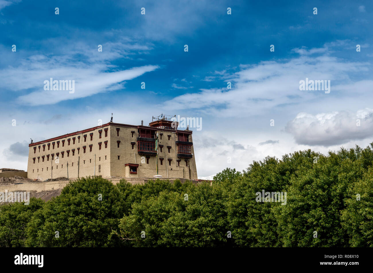 The Stok Palace and Gompa, built on a hill high above the green Indus ...