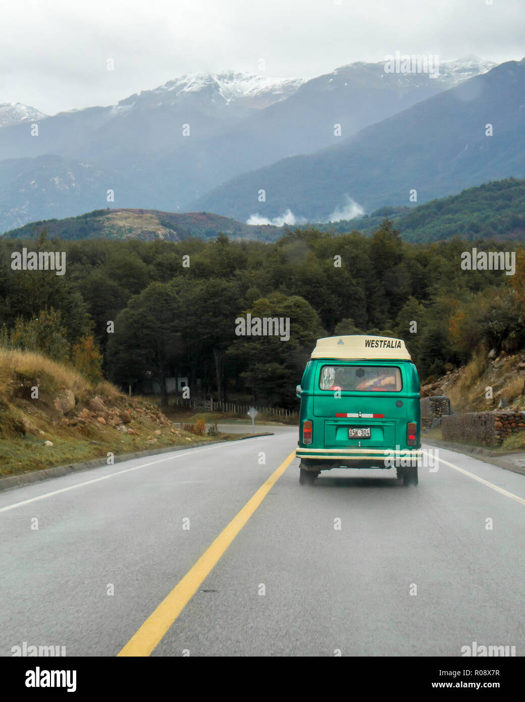 Volkswagen Van on a road trip at the Austral Rute. He is peruvian, she ...