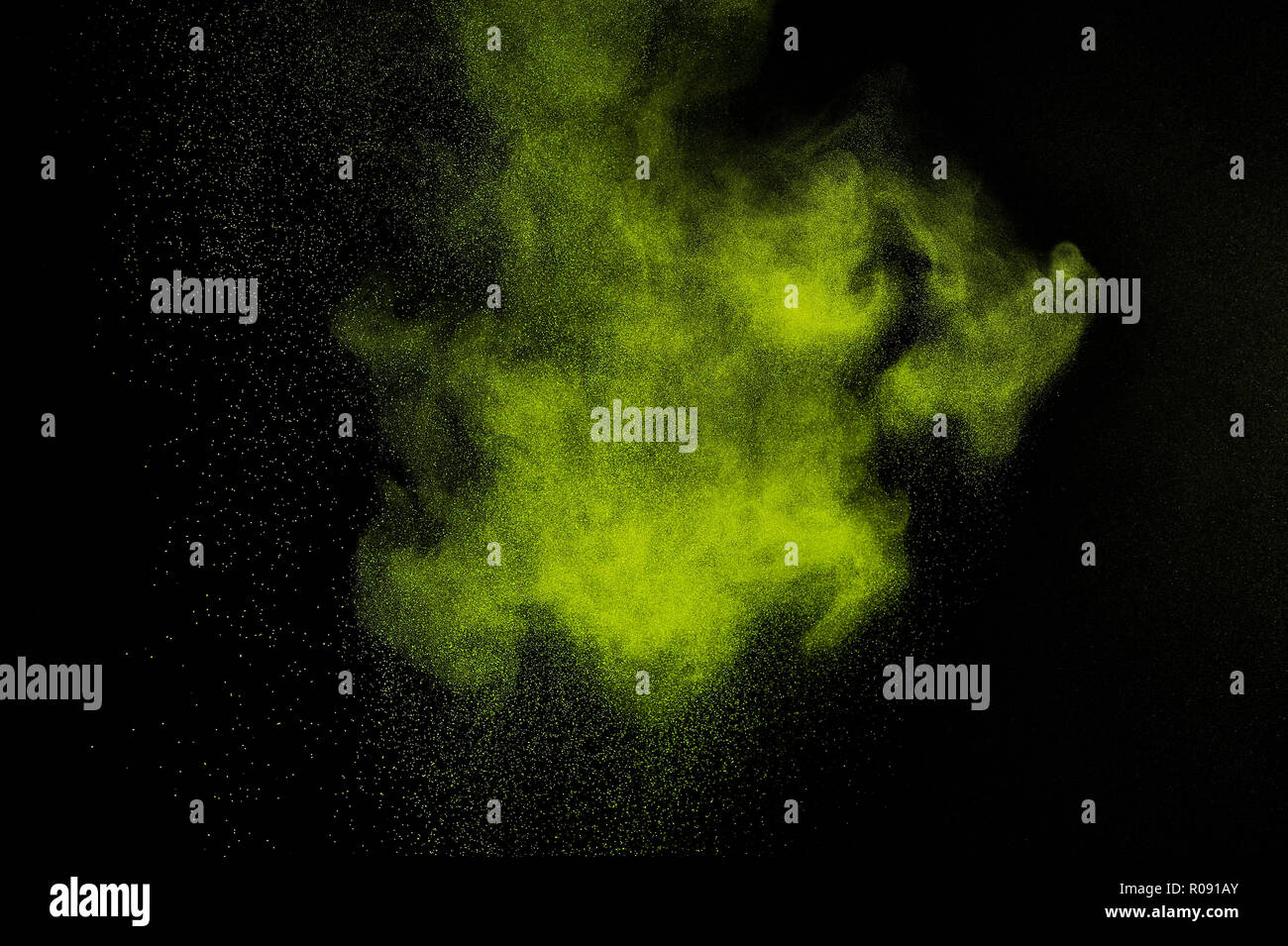 Abstract green paint Holi. Abstract green powder explosion on black ...