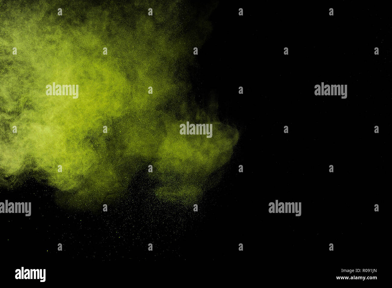 Abstract green paint Holi. Abstract green powder explosion on black ...