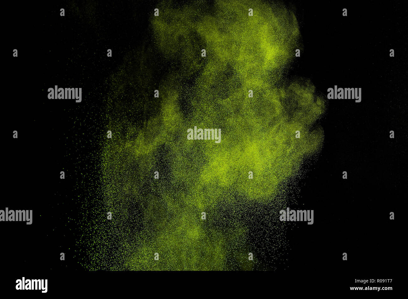 Abstract green paint Holi. Abstract green powder explosion on black ...