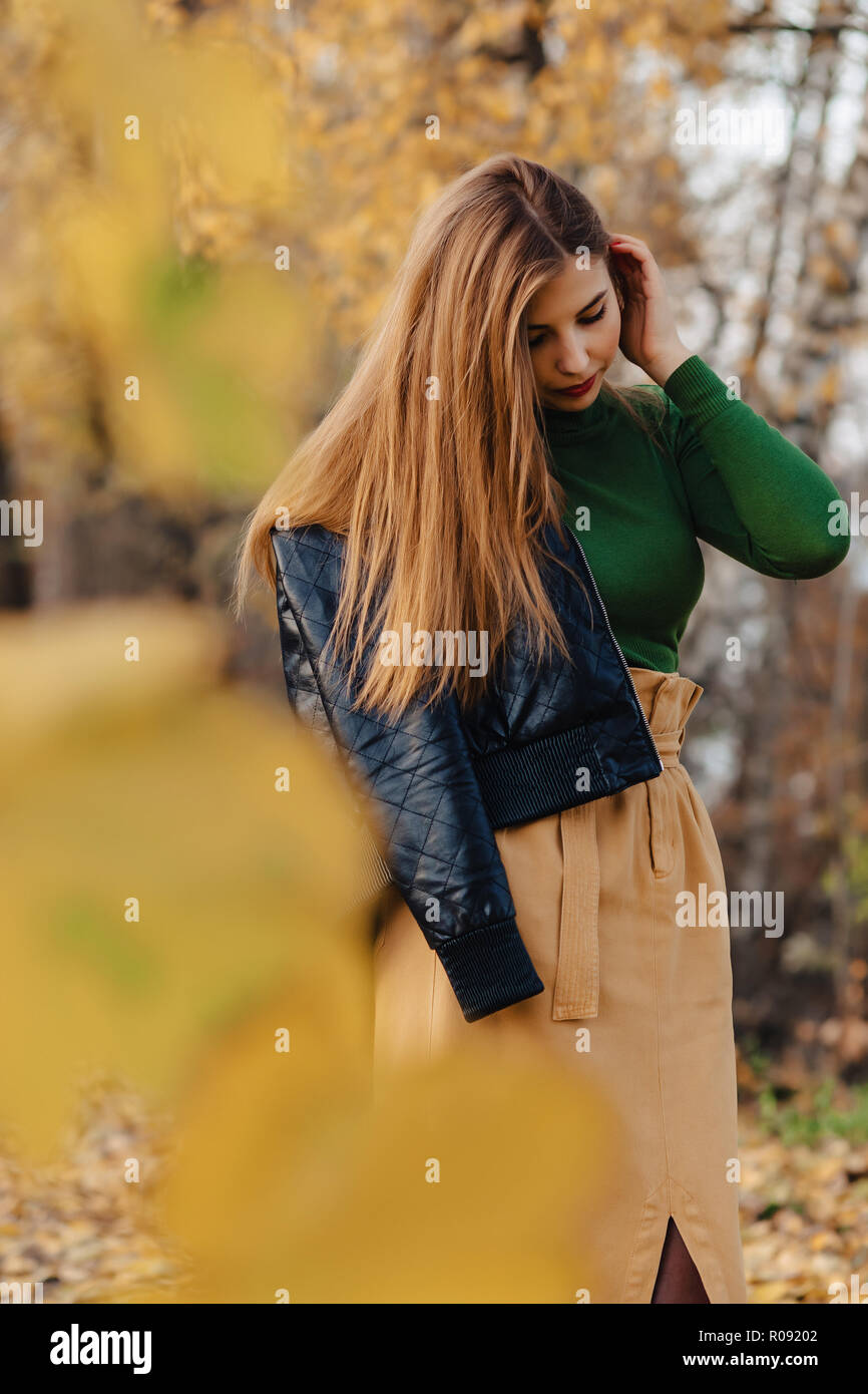 cozy stylish young girl walk at autumn colorful park alone Stock Photo ...