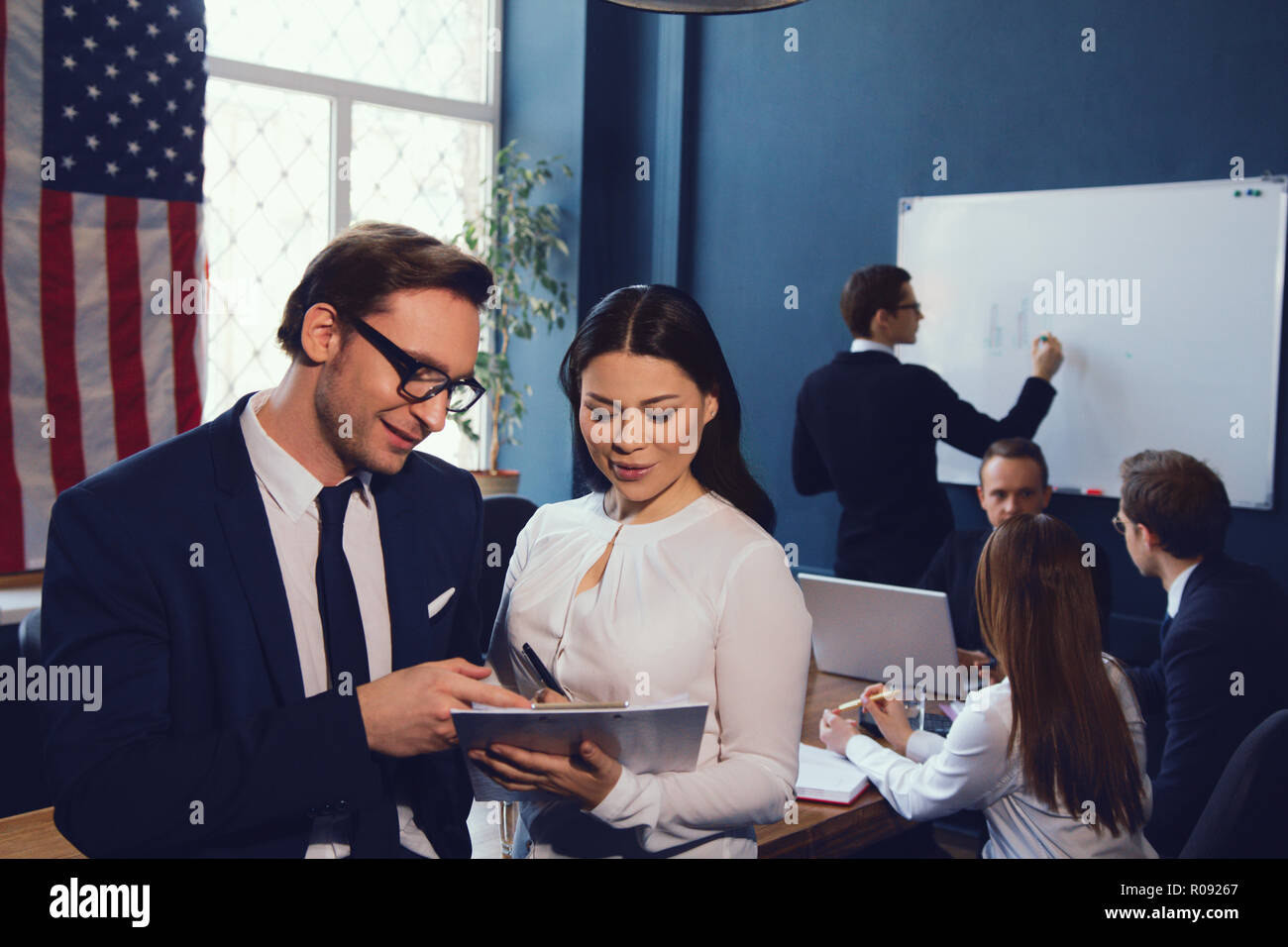 Business Colleagues Having Meeting In Modern Office . Discussing ...