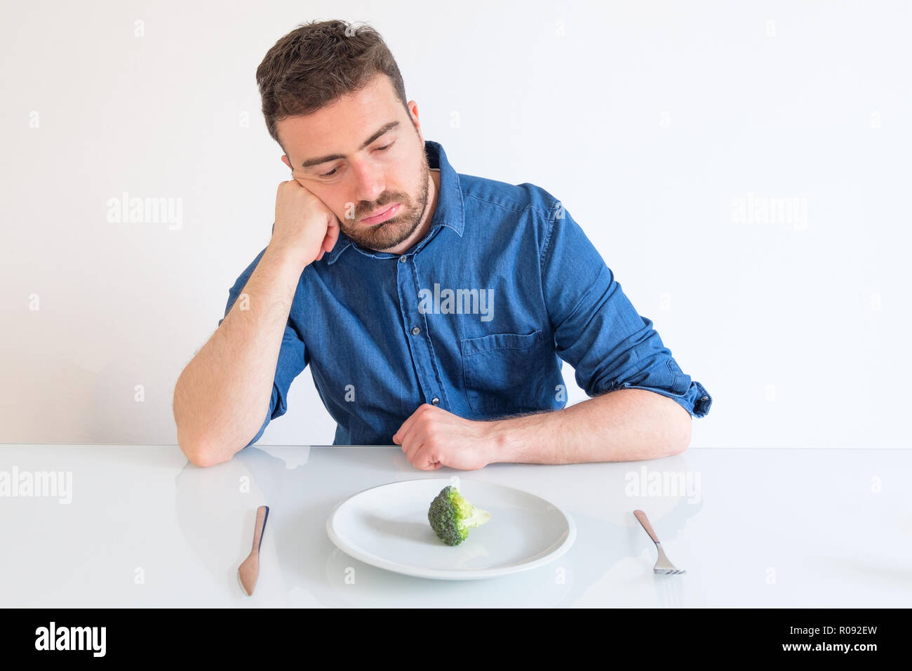 Poor man eating hi-res stock photography and images - Alamy