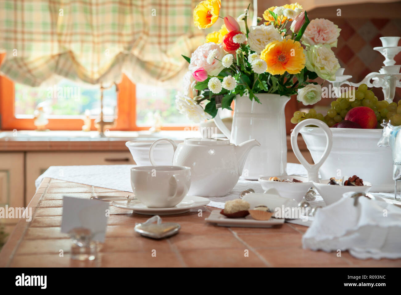 Table in the kitchen with dishes Stock Photo - Alamy