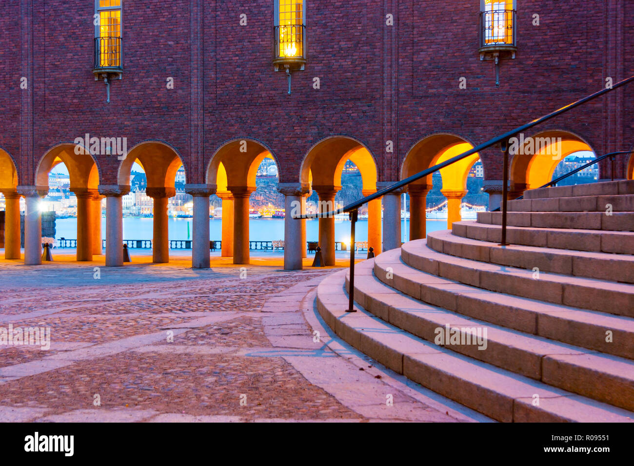 Town hall courtyard arcade and staircase at evening, Stockholm, Sweden ...